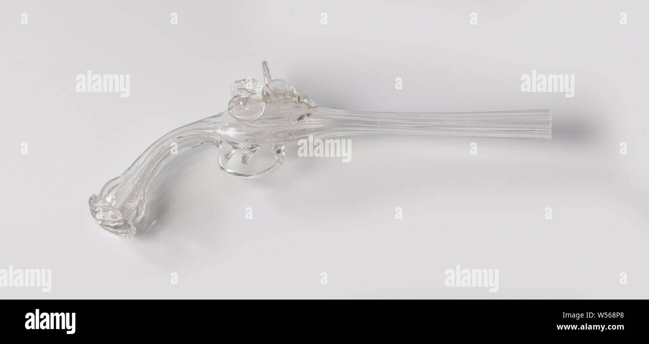 Glass shaped like a gun, The flask with pronounced button and the ...