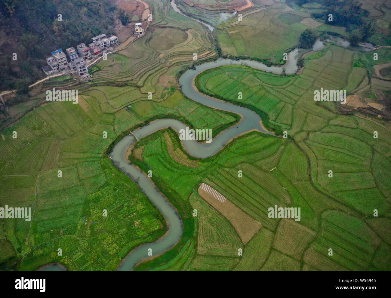 Aerial view of the Ming River, a symbol of Bama, flowing through the ...