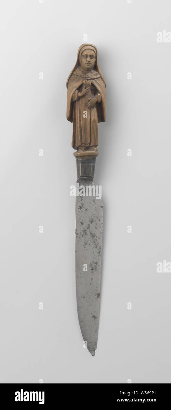 Knife with a handle in the shape of a nun, The nun holds a flaming ...