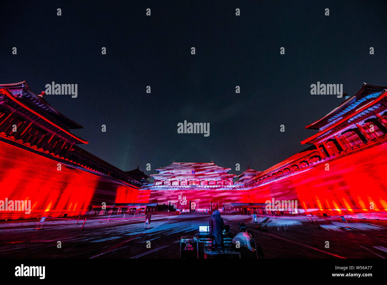 The Palace Museum, also known as the Forbidden City, is illuminated by colorful lights for a ...