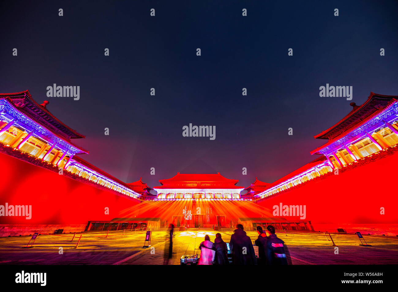 The Palace Museum, also known as the Forbidden City, is illuminated by colorful lights for a ...