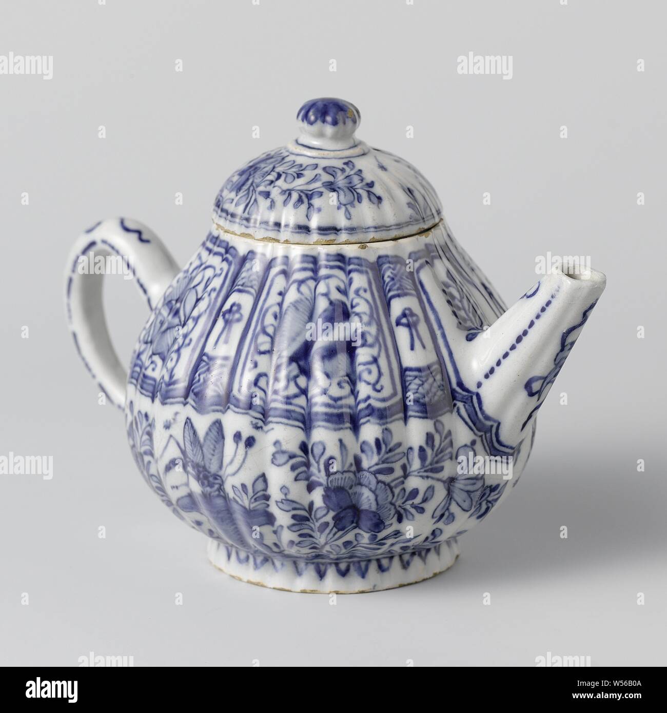 Teapot of faience with a decoration inspired by Chinese porcelain ...