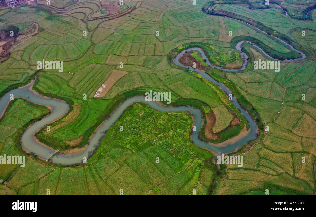 Aerial view of the Ming River, a symbol of Bama, flowing through the ...