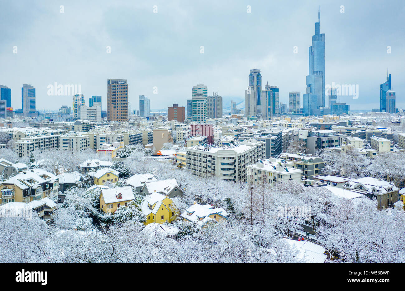 An aerial view of buildings covered with snow in Nanjing city, east ...