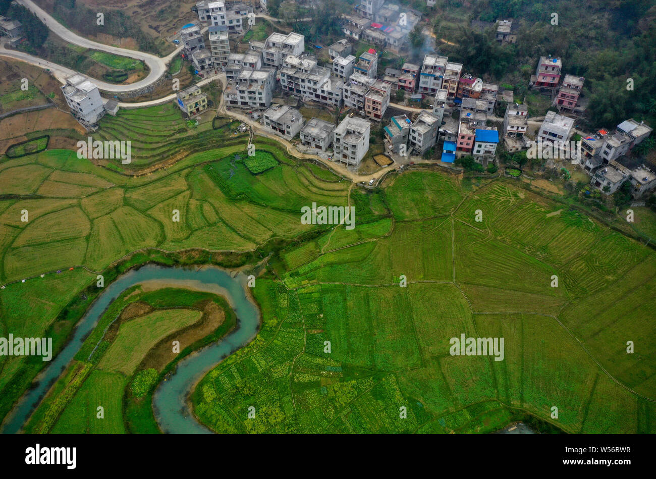 Aerial view of the Ming River, a symbol of Bama, flowing through the ...