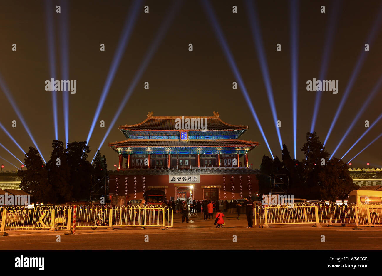 The Palace Museum, also known as the Forbidden City, is illuminated by colorful lights during a ...