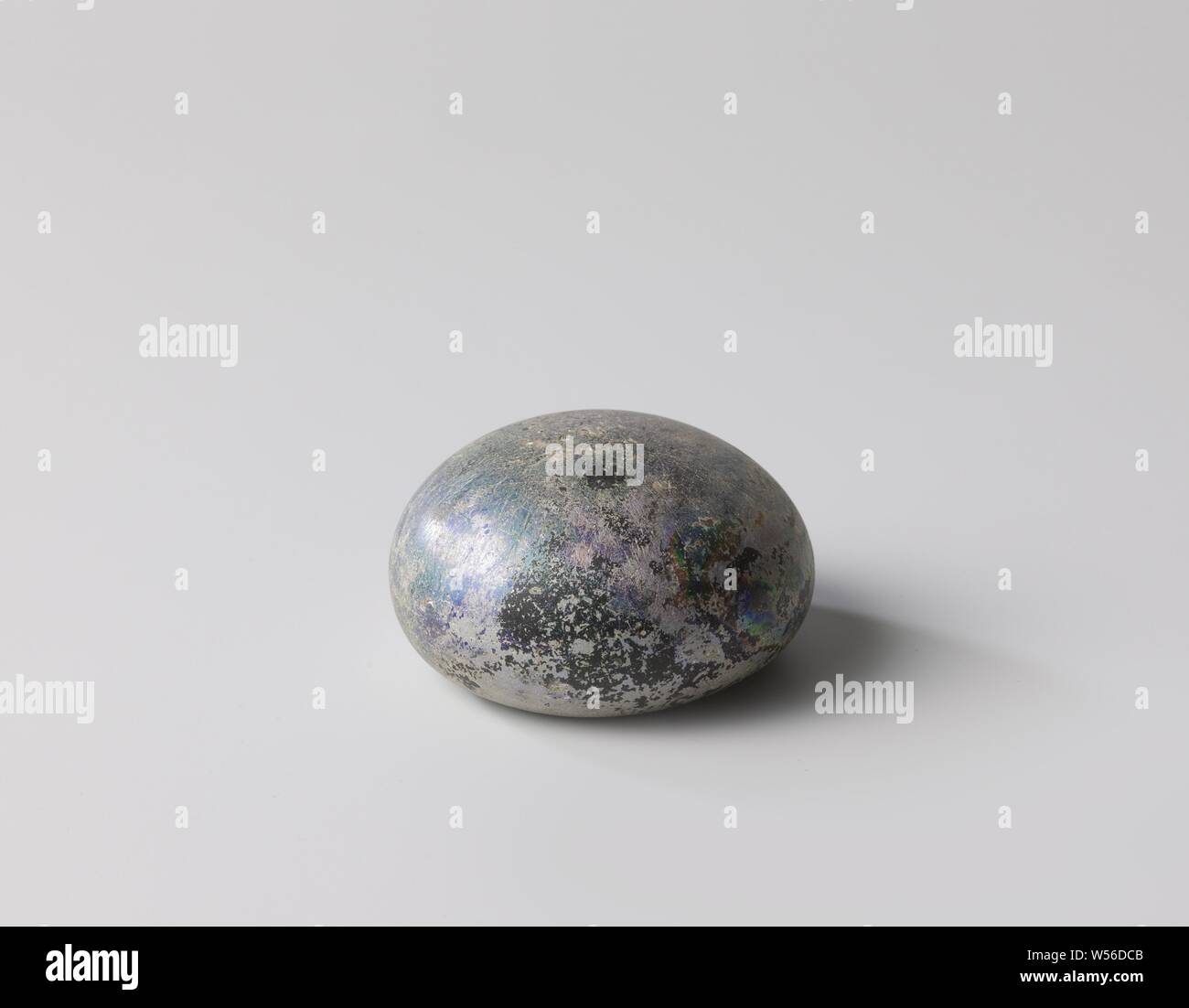 Gloss stone, Flattened spherical body, one side of which is inserted ...