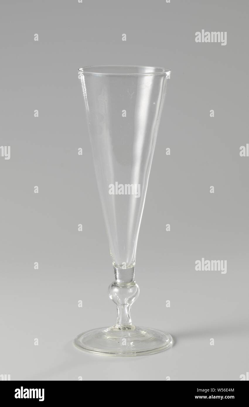 Flute glass, Flute glass on flat base with folded edge. Baluster-shaped ...