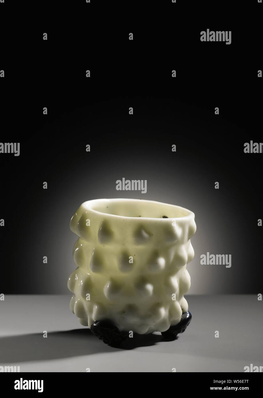 Knob beaker on legs, Small opaque white glass beaker with inserted ...