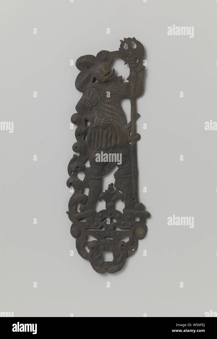 Plate in the shape of a warrior with halberd, The plate consists of a ...