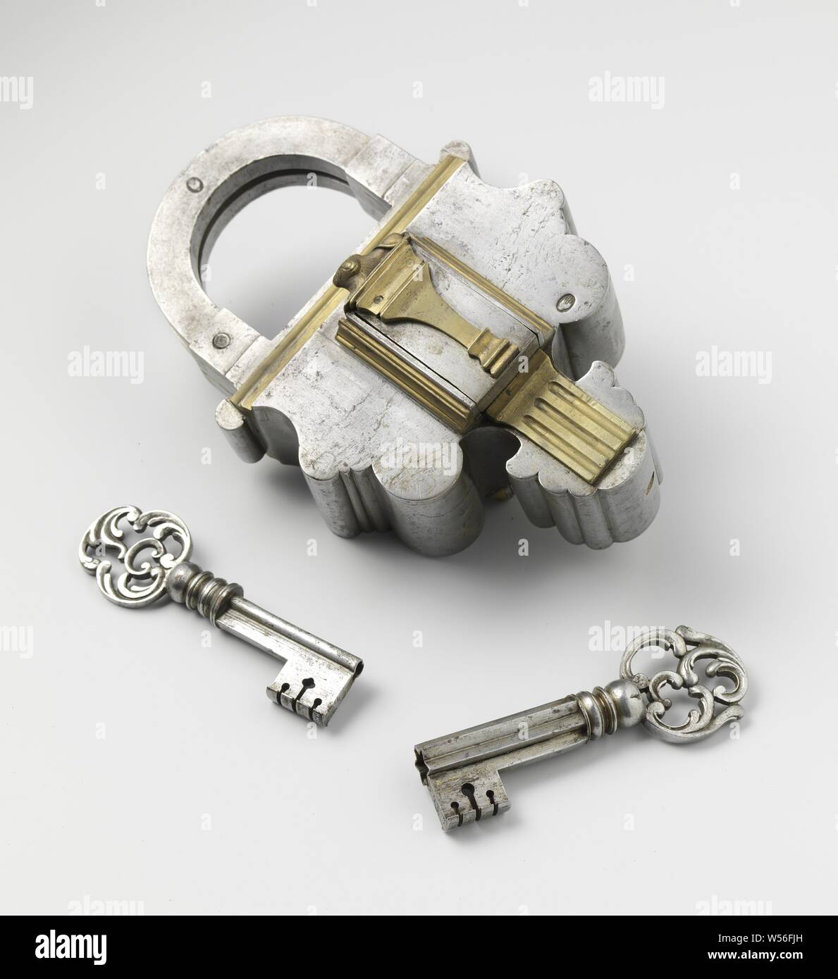 Padlock adorned with copper, with two wefts and two keys, A heavy ...