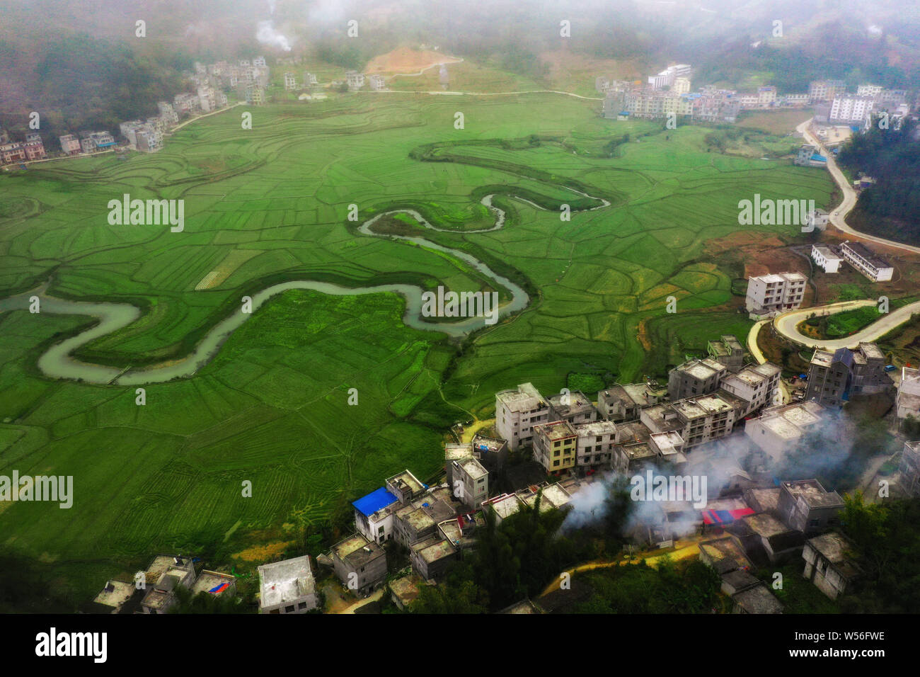 Aerial view of the Ming River, a symbol of Bama, flowing through the ...