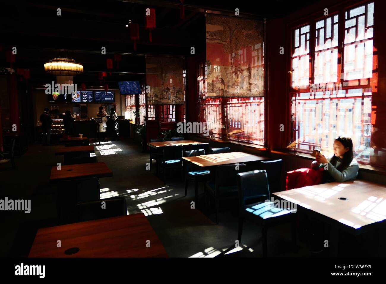 An interior view of the emperor-themed hotpot eatery named Corner Tower ...
