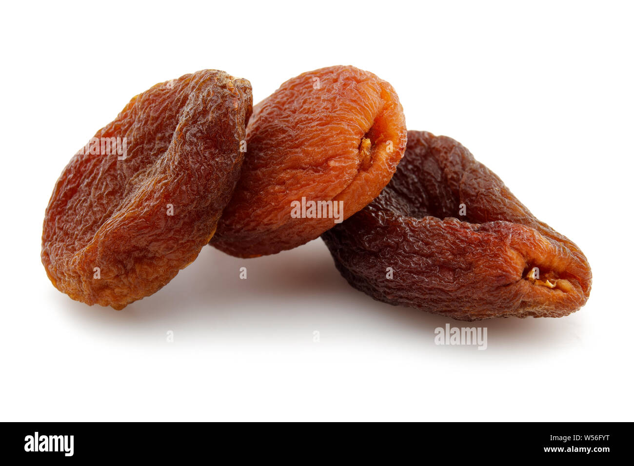 Organic dried apricots isolated on white background Stock Photo - Alamy