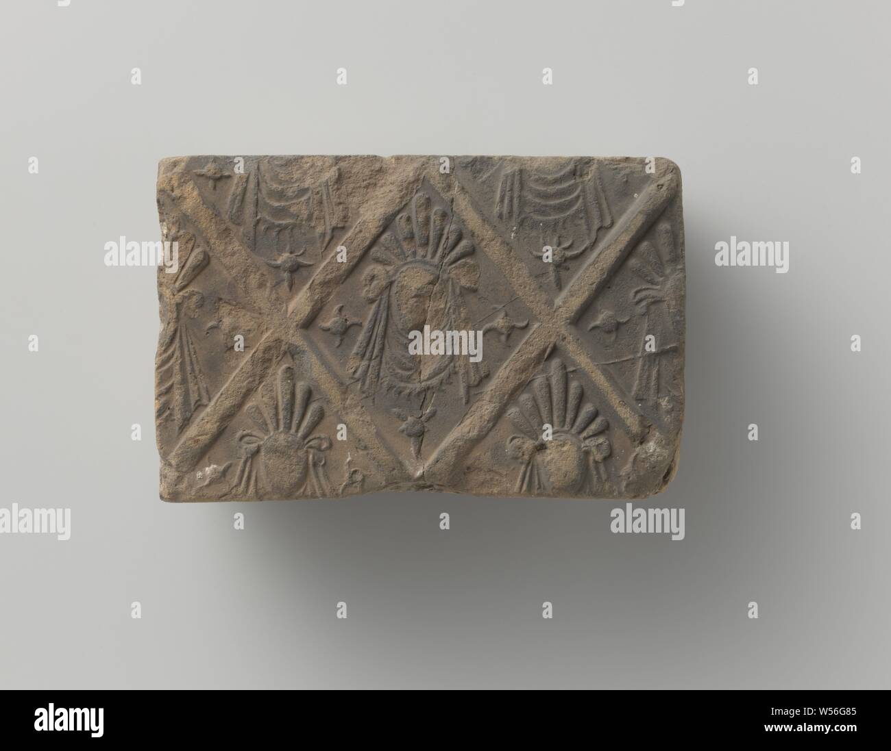 heartstone with a mask in a profiled window, heartstone with a mask ...