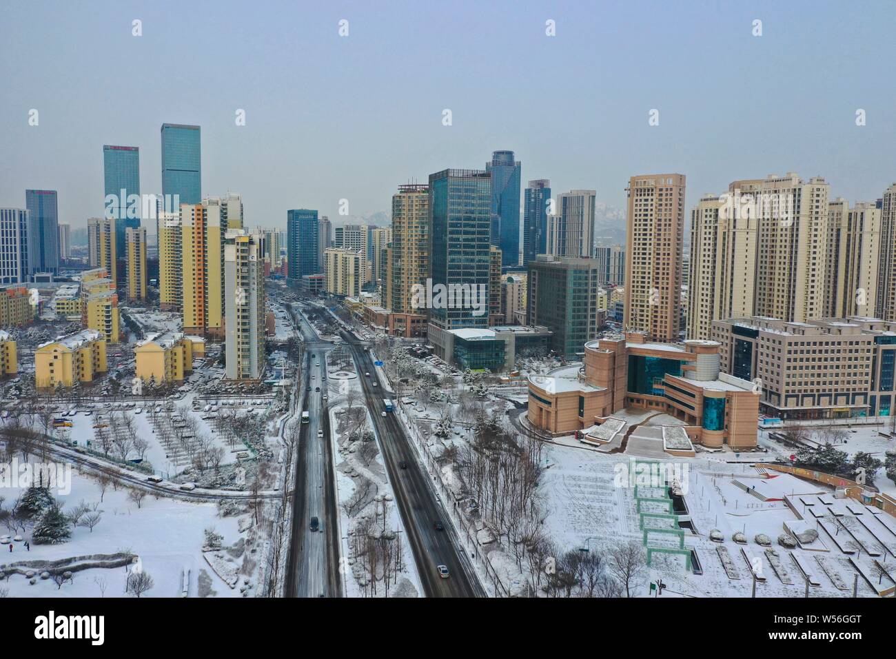 Aerial view of snow-covered buildings after a heavy snowfall in Qingdao ...
