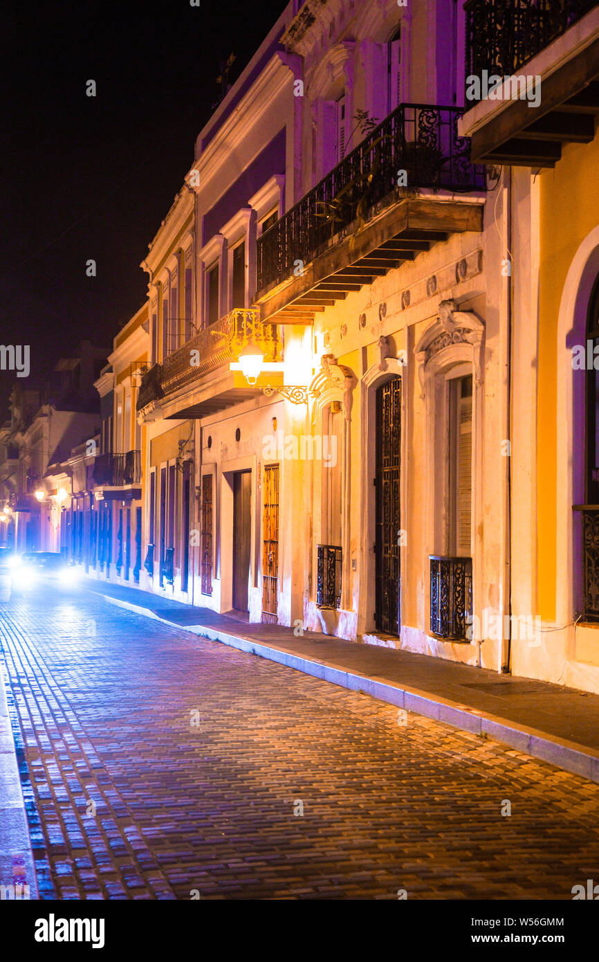 Old San Juan Puerto Rico street seen at night with old architecture and ...