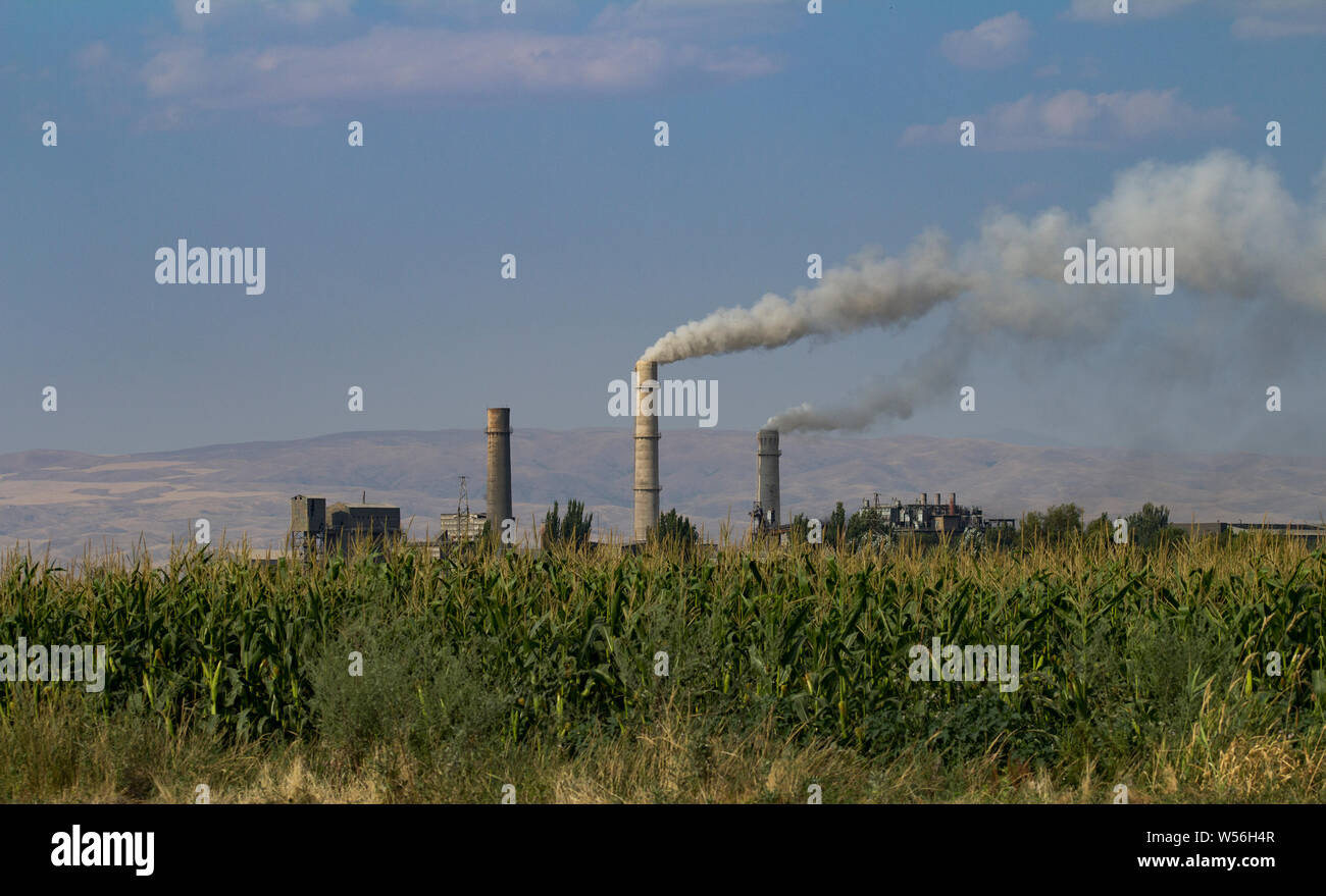 high pollution from power plant. Ecological concept image Stock Photo ...