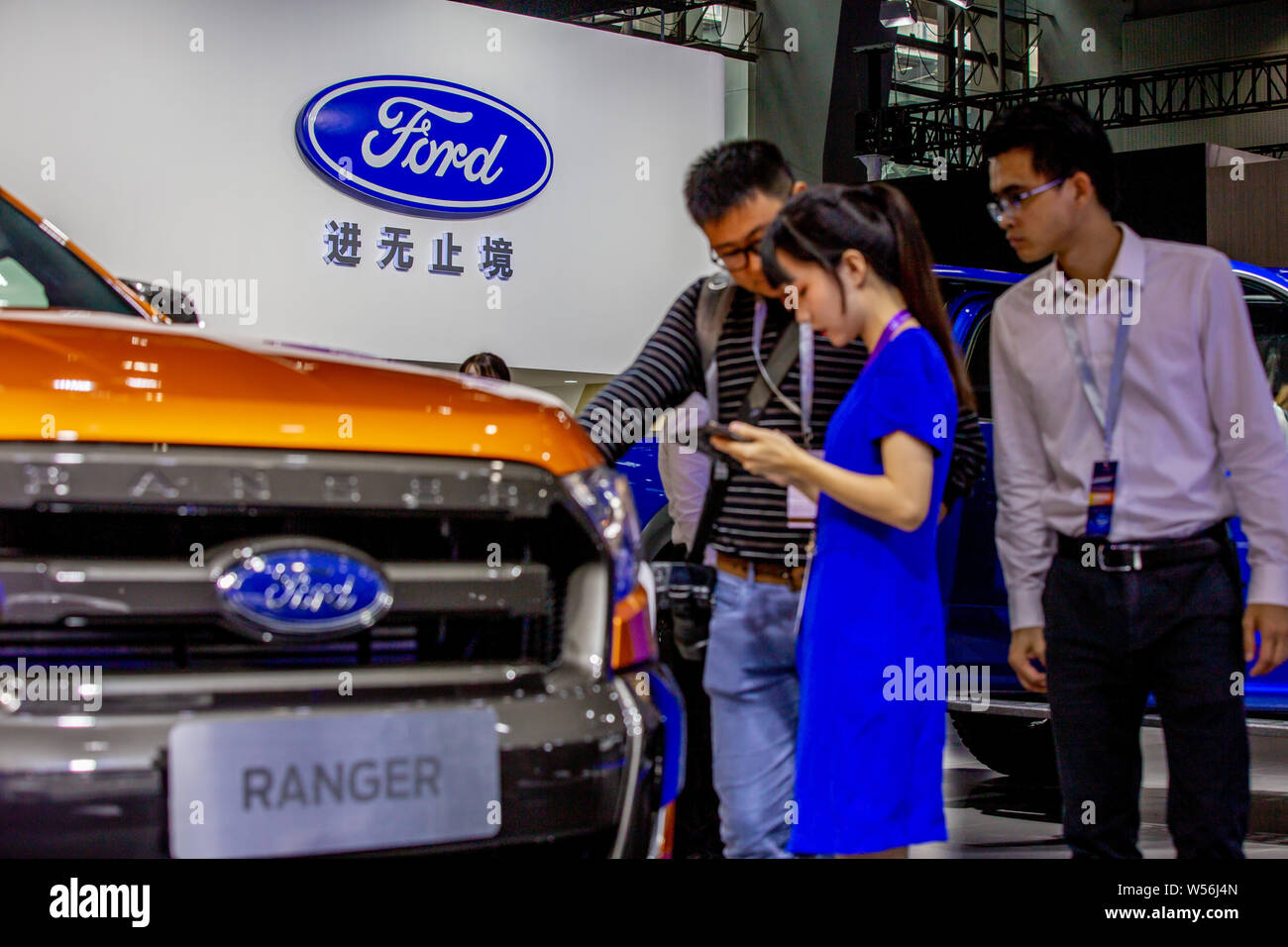 --FILE--People visit the stand of Ford during the 16th China (Guangzhou ...