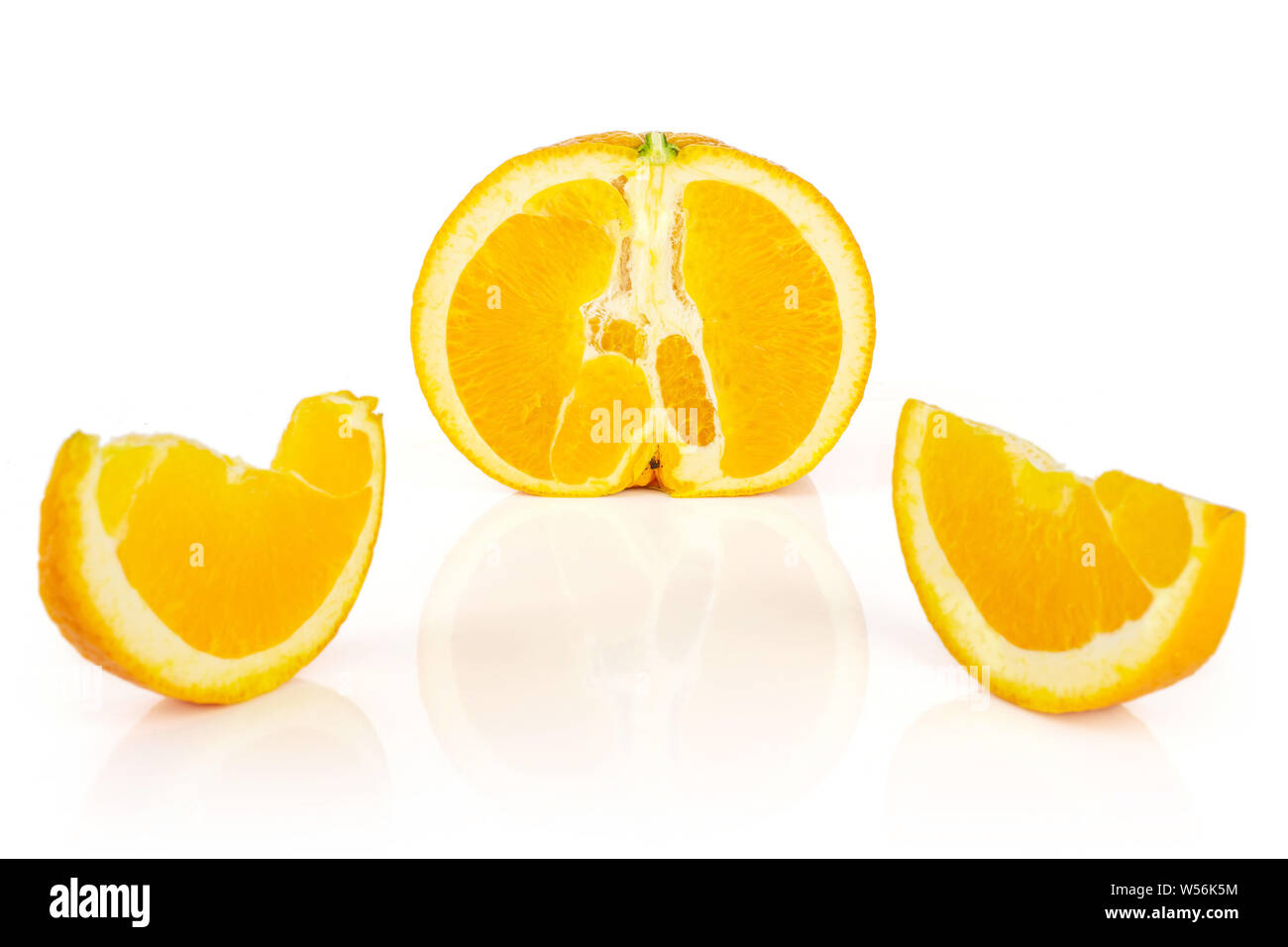 Group of one half two slices of fresh sweet orange isolated on white ...