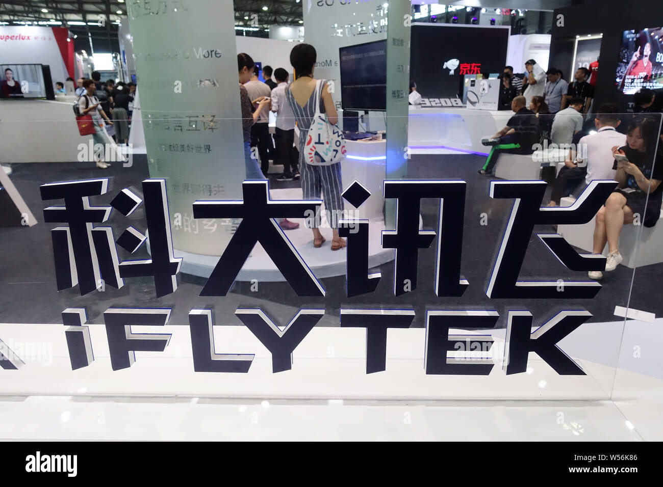 --FILE--People visit the stand of iFlytek during an expo in Shanghai ...