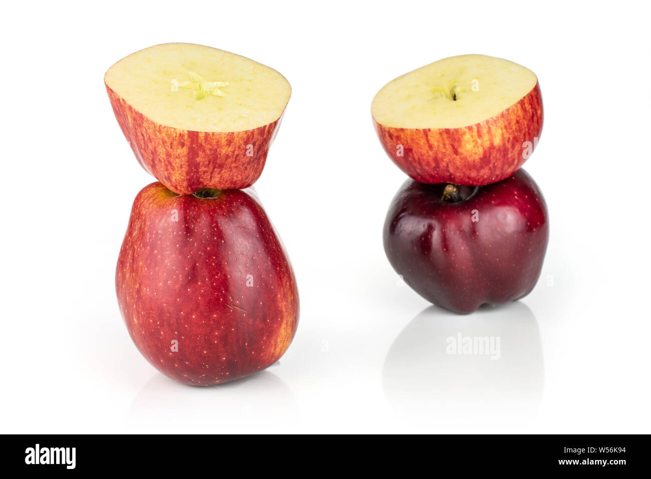 Group of two whole two halves of fresh apple red delicious the halves ...