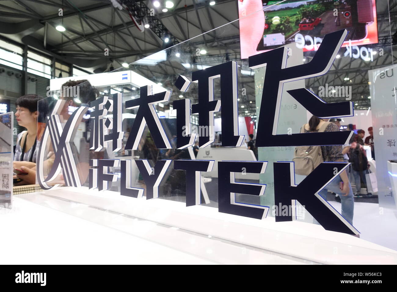 --FILE--People visit the stand of iFlytek during an expo in Shanghai ...