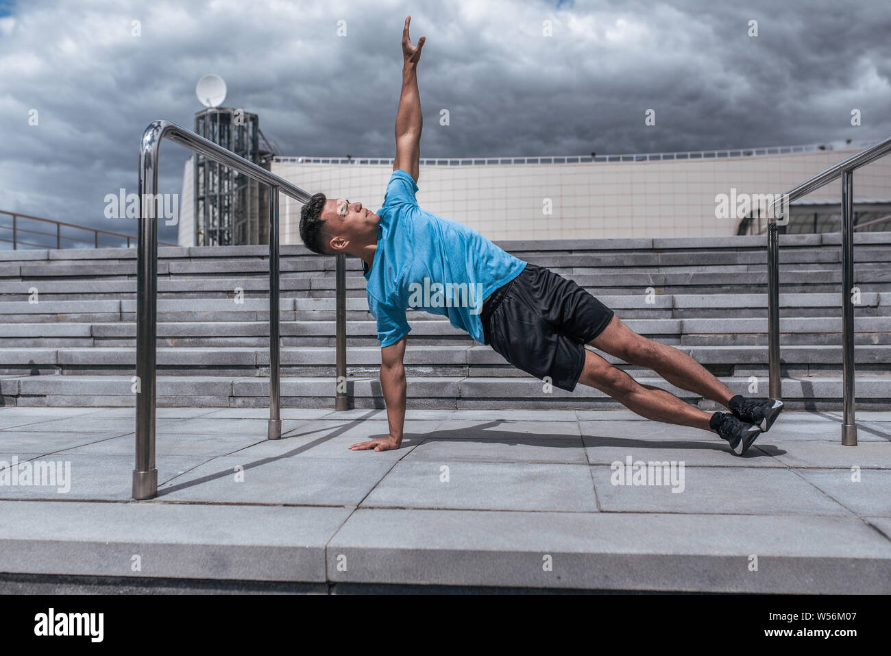 Side plank pose men hi-res stock photography and images - Alamy