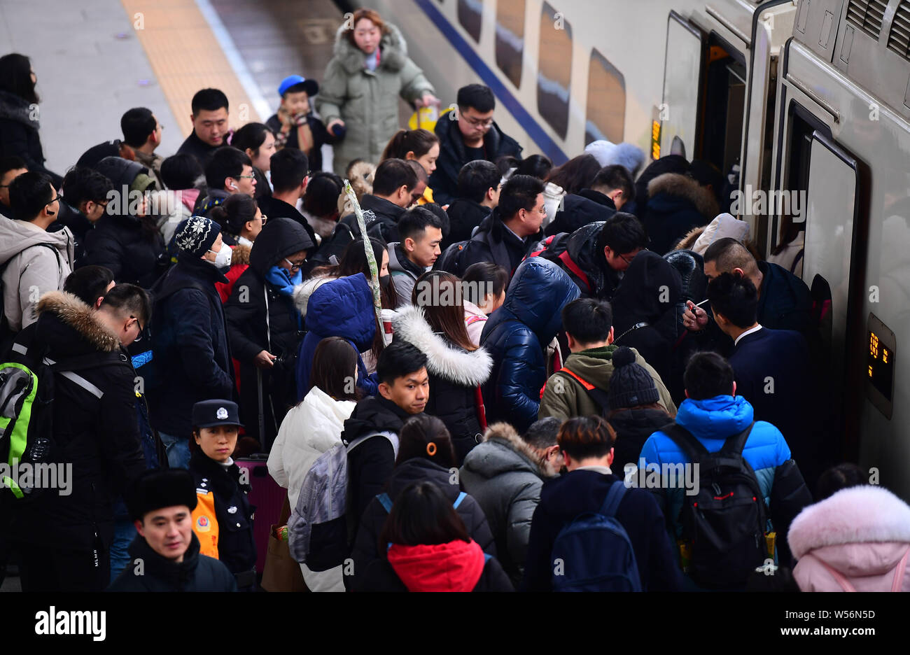 Chinese passengers who return to work from the Chinese Lunar New Year ...