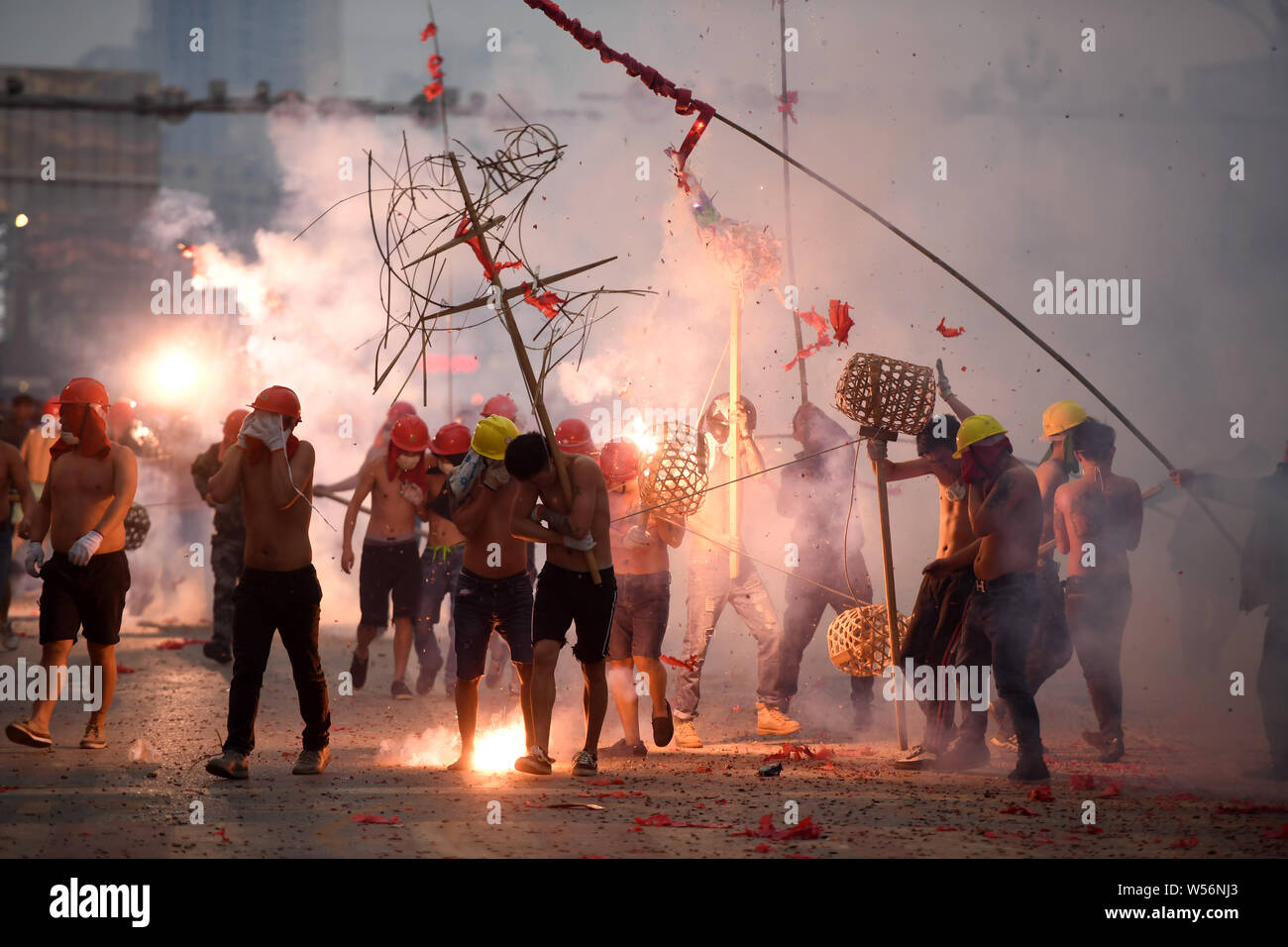 Local Chinese people conduct firecracker dragon performance to ...
