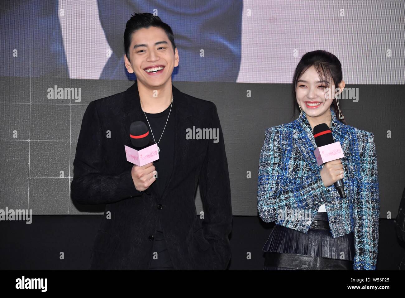 Chinese actress Jelly Lin or Lin Yun, right, and Taiwanese actor Darren ...