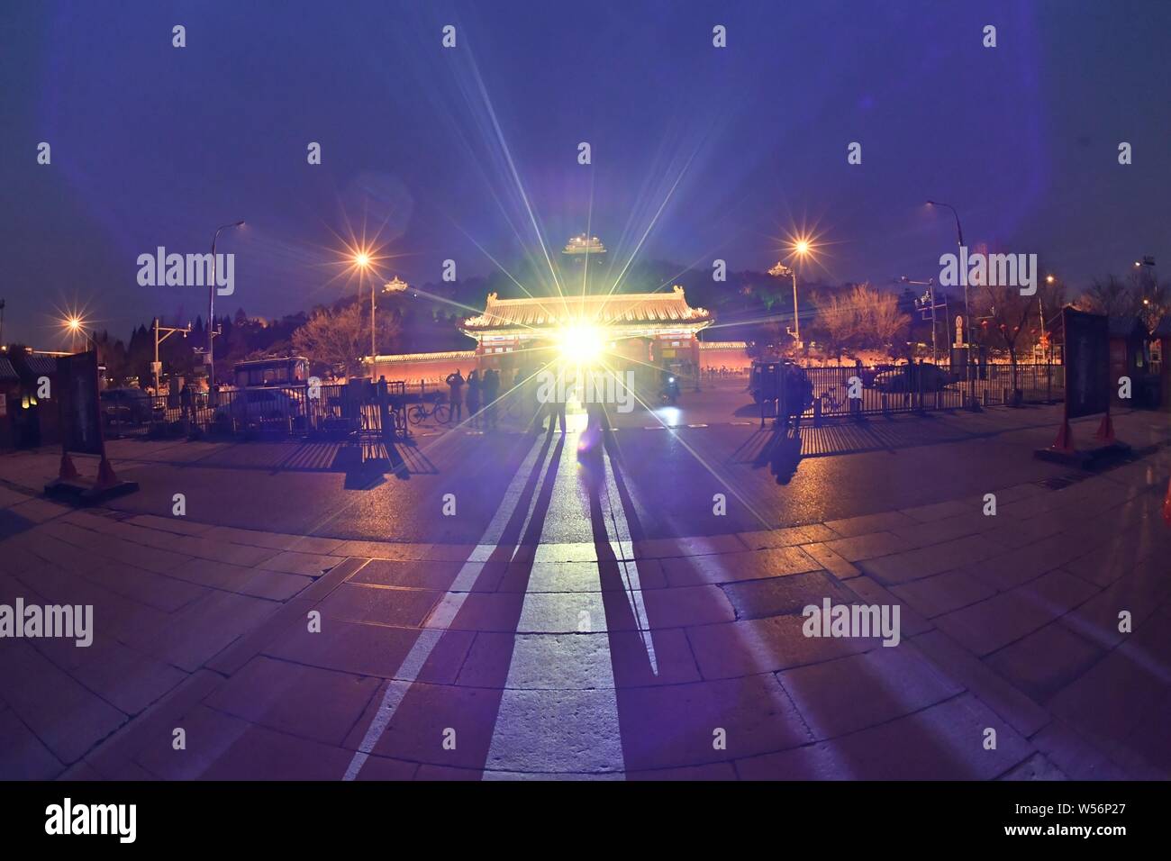 The Palace Museum, also known as the Forbidden City, is illuminated by ...