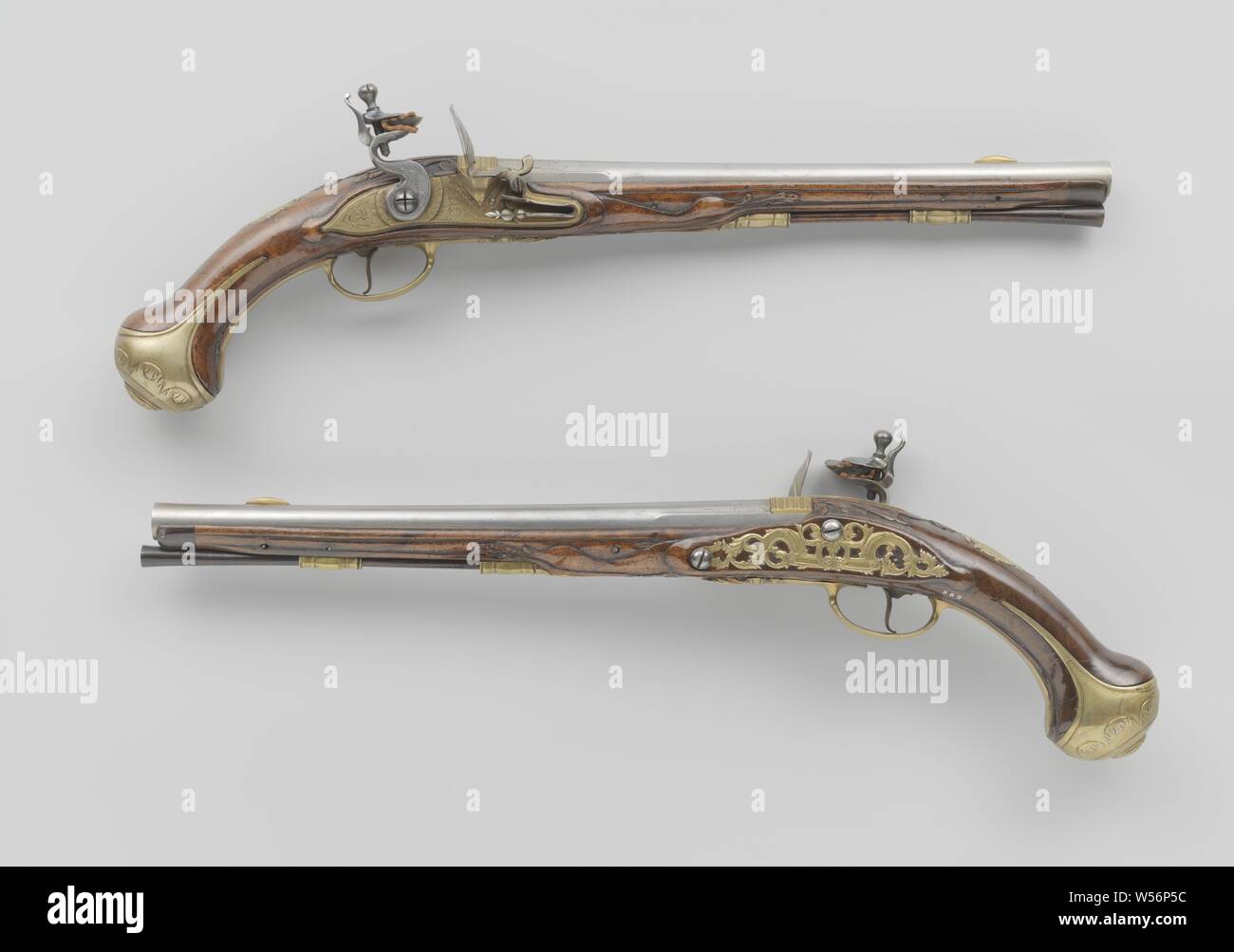 Flint gun, Part of a couple. The lock has a partially blued rooster and ...