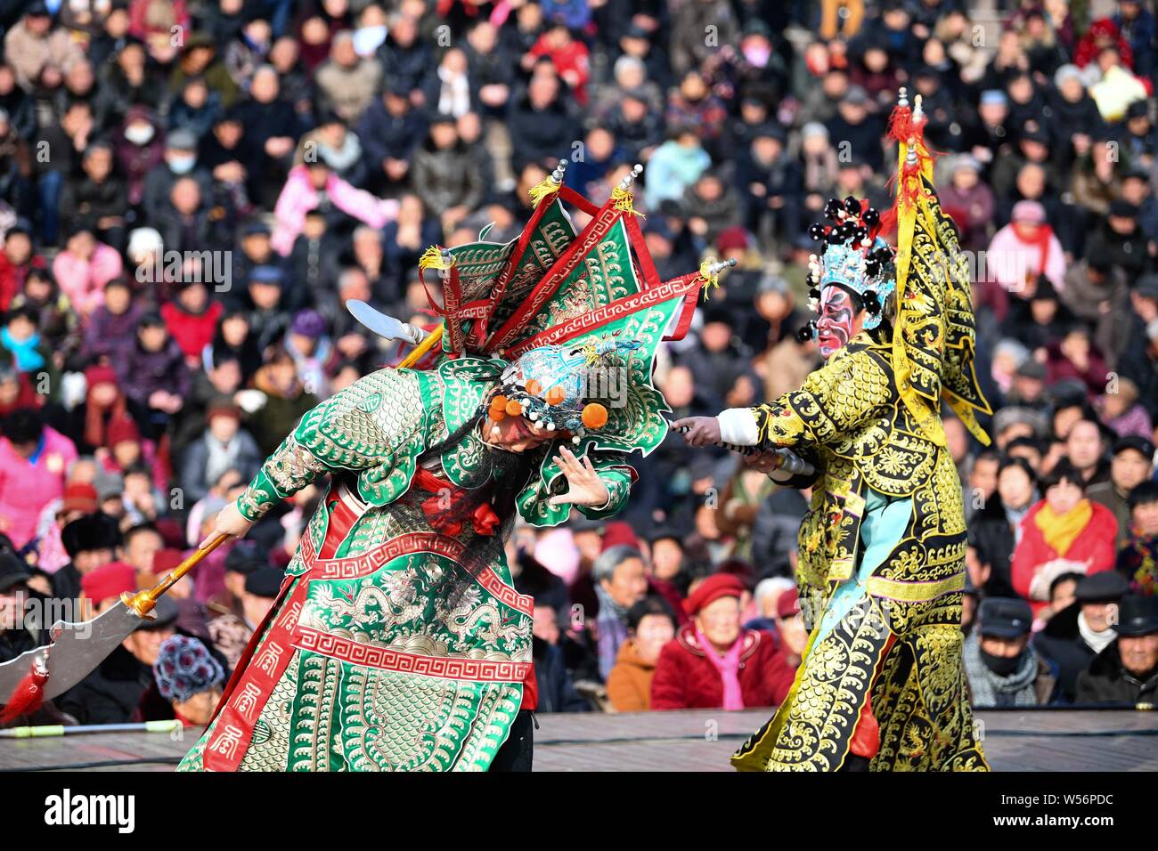 Actors perform Bangju opera at Weiwu plaza in Bozhou city, east China's ...