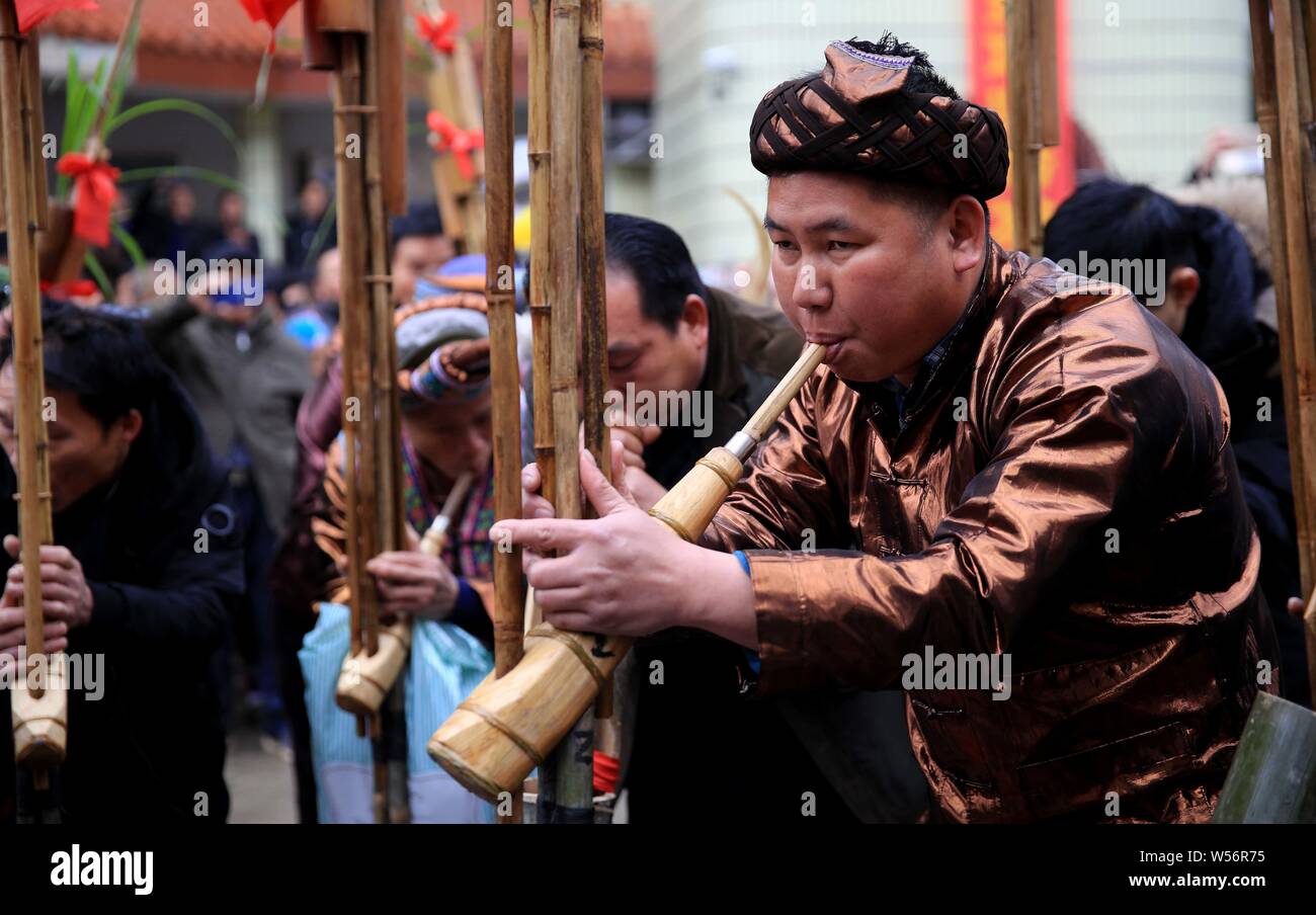 Chinese people of Miao ethnic group dressed in traditional costumes ...