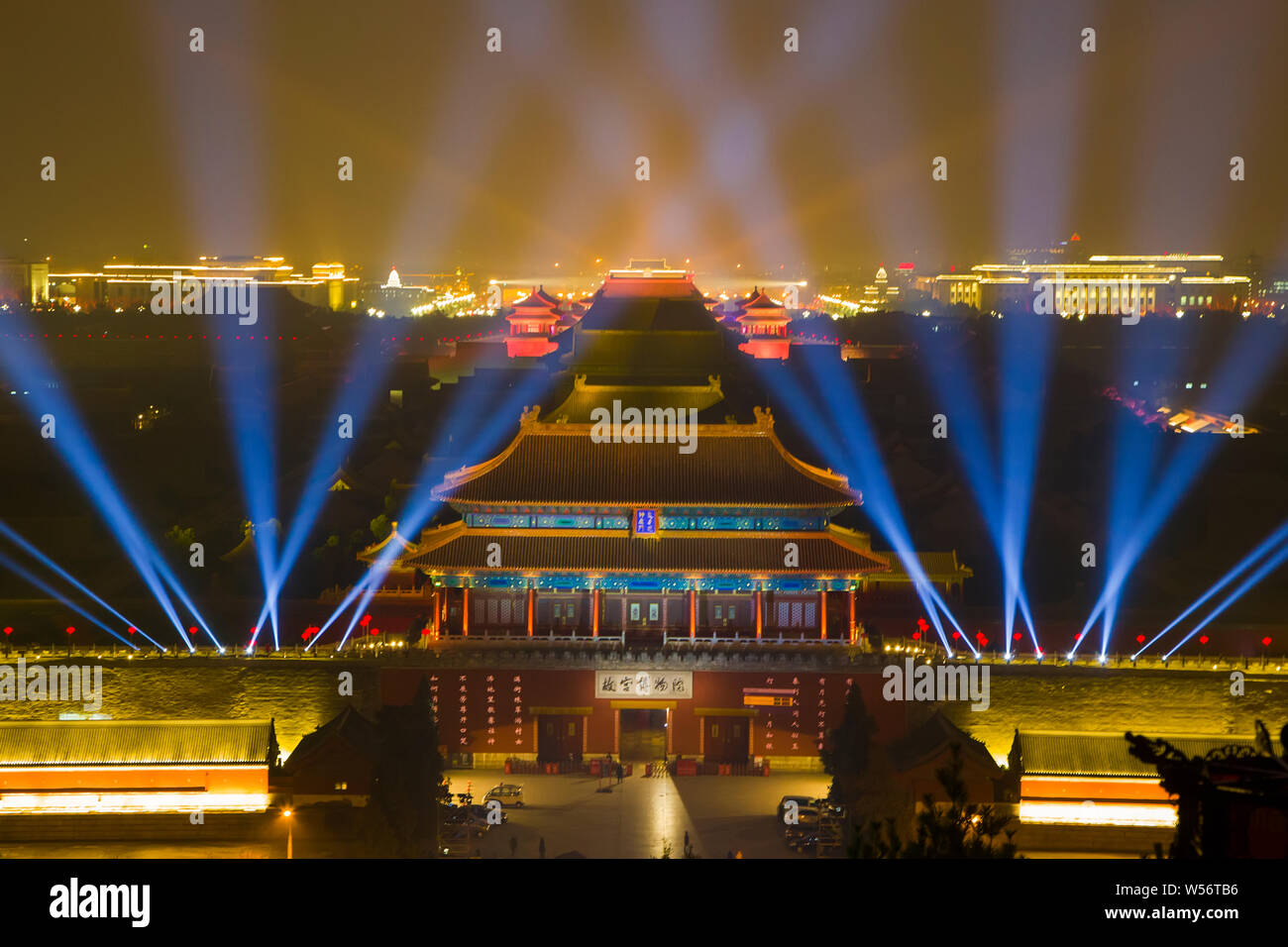 The Palace Museum, also known as the Forbidden City, is illuminated by colorful lights for a ...