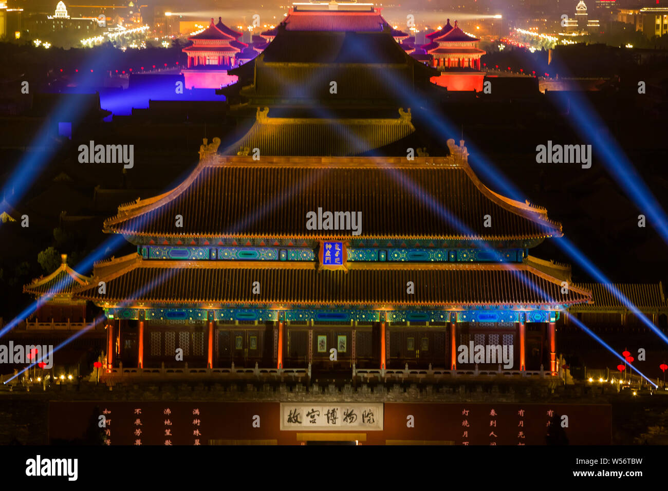 The Palace Museum, also known as the Forbidden City, is illuminated by colorful lights for a ...