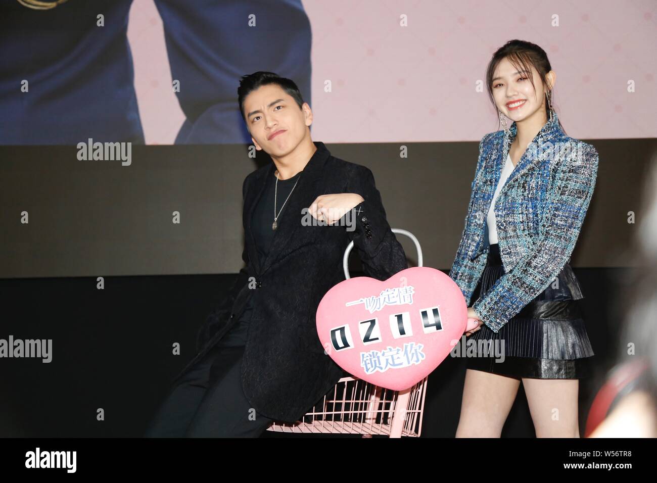 Chinese actress Jelly Lin or Lin Yun, right, and Taiwanese actor Darren ...