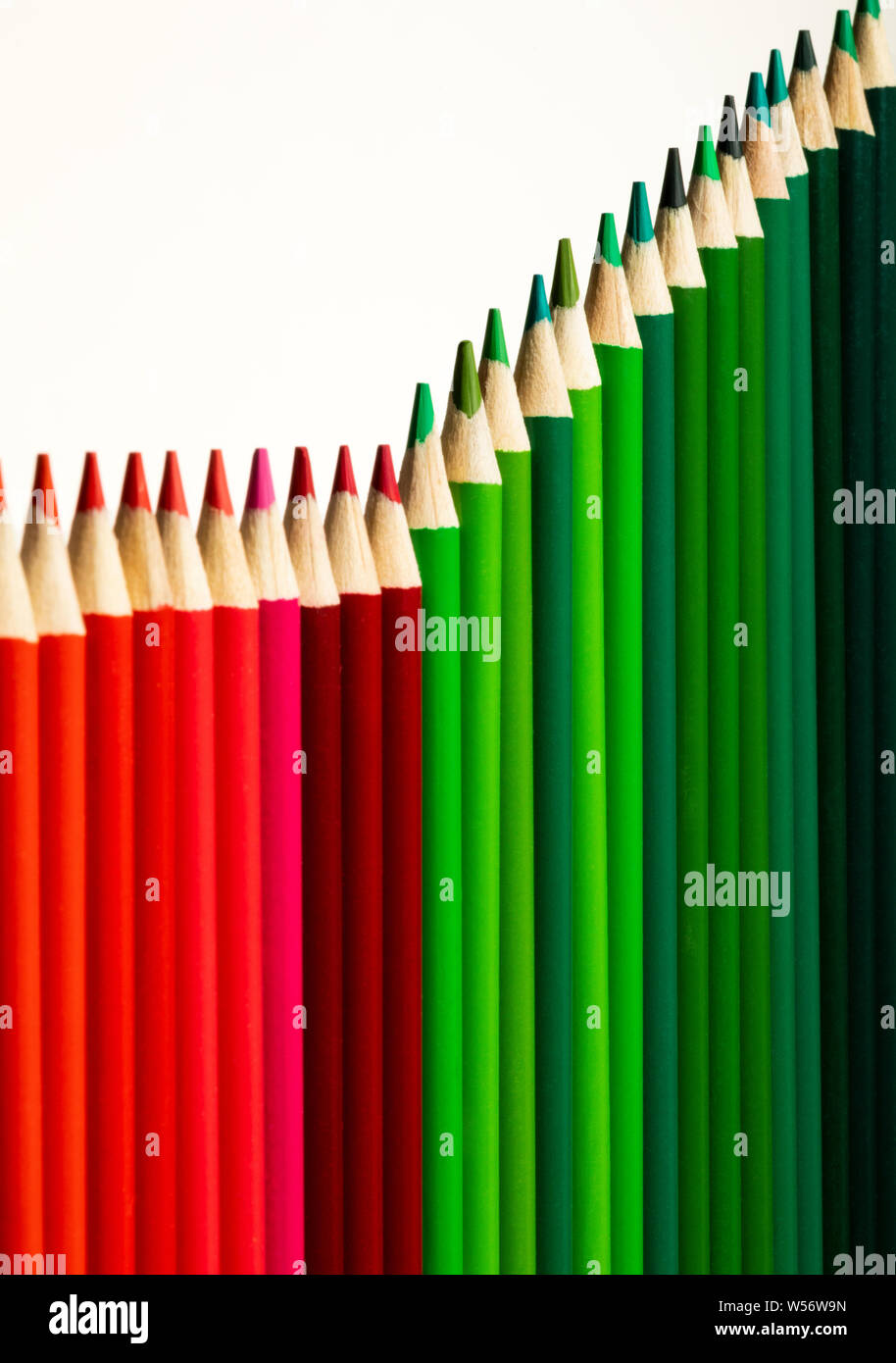 Colored red & green pencils representing business graph of increasing ...