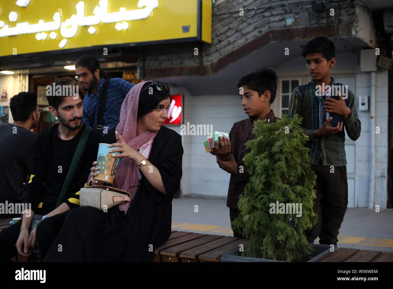 July 25, 2019, Mashhad, Iran: Shir Agha, a child labourer sells gum to ...