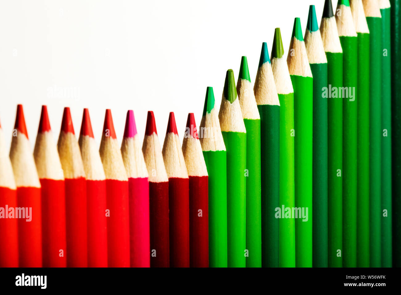 Colored red & green pencils representing business graph of increasing ...