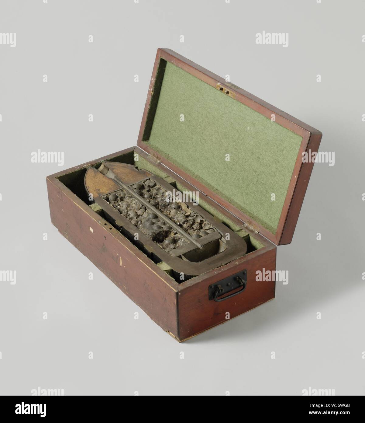 23 cm Shrapnel Shell in a Wooden Box, Half a 23 cm grenade shaped sawn ...