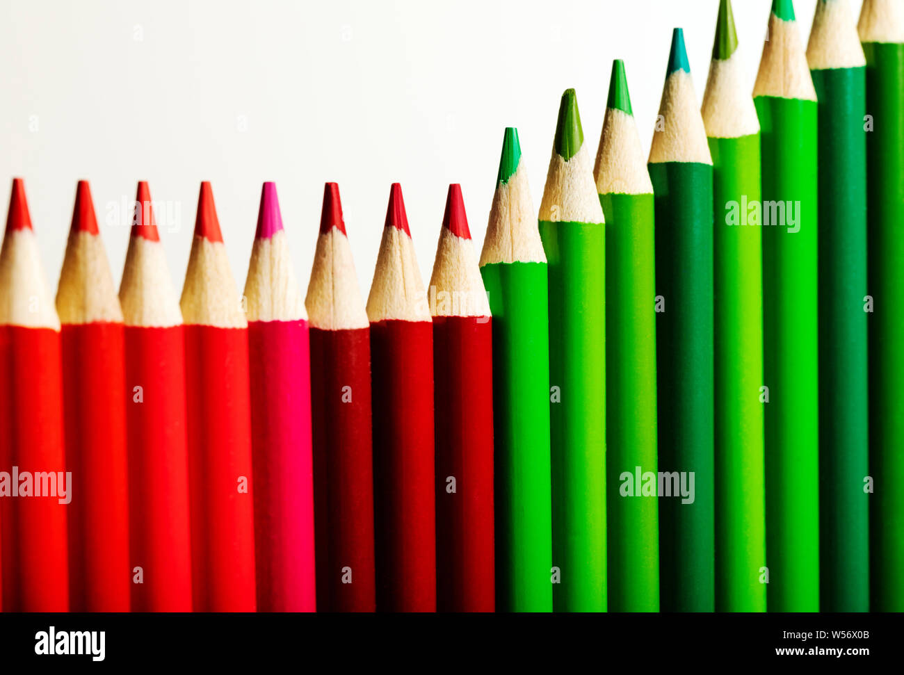 Colored red & green pencils representing business graph of increasing ...