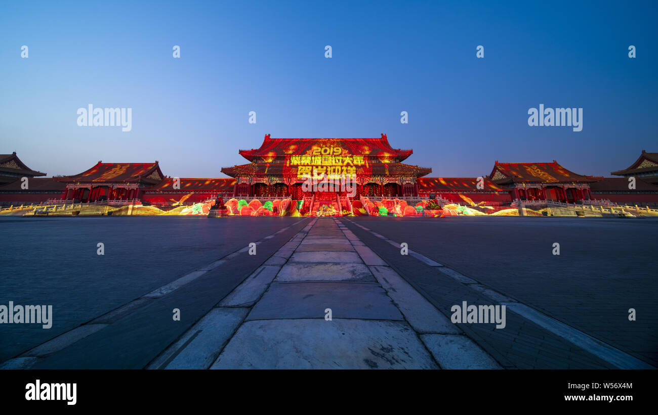The Palace Museum, also known as the Forbidden City, is illuminated by ...