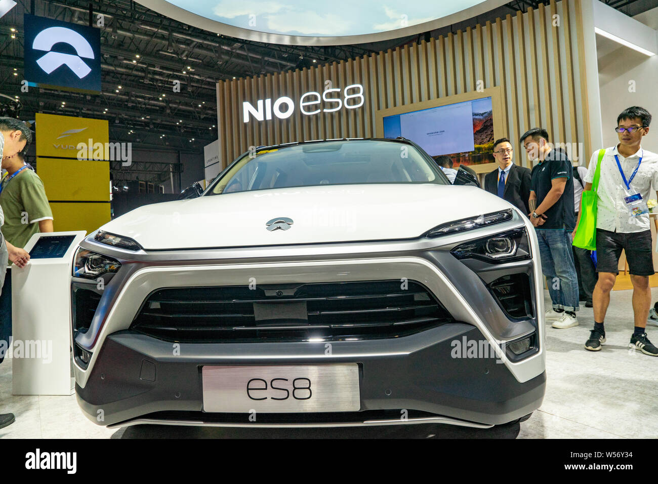 --FILE--Chinese visitors view a NIO ES8 electric SUV of NextEV on display during the 20th China ...