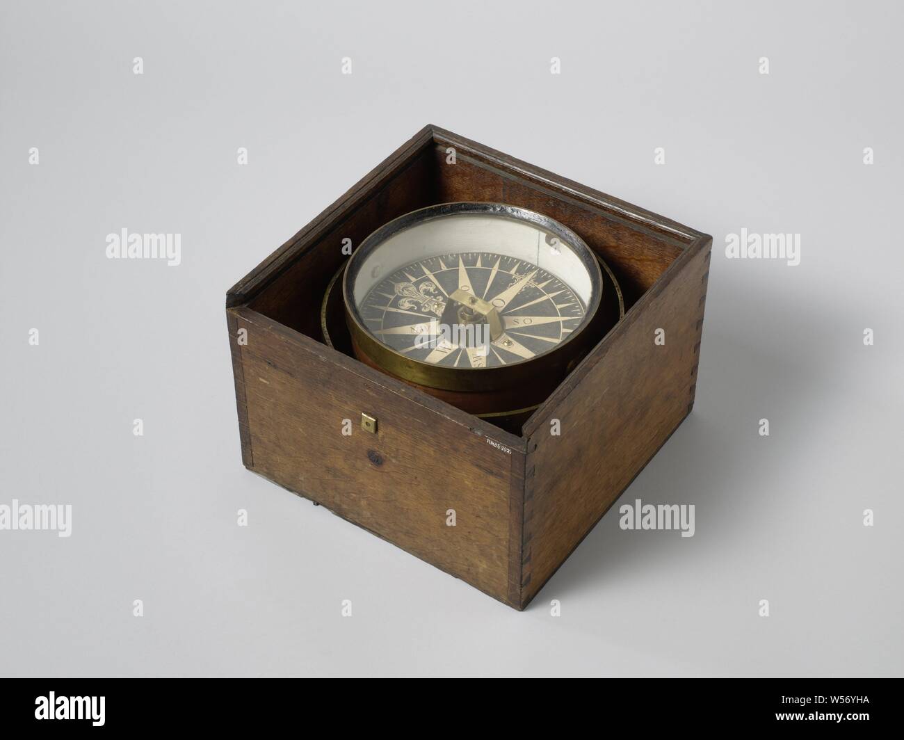 Azimuth Compass, Azimuth compass in cardanus ring in a wooden box. The ...