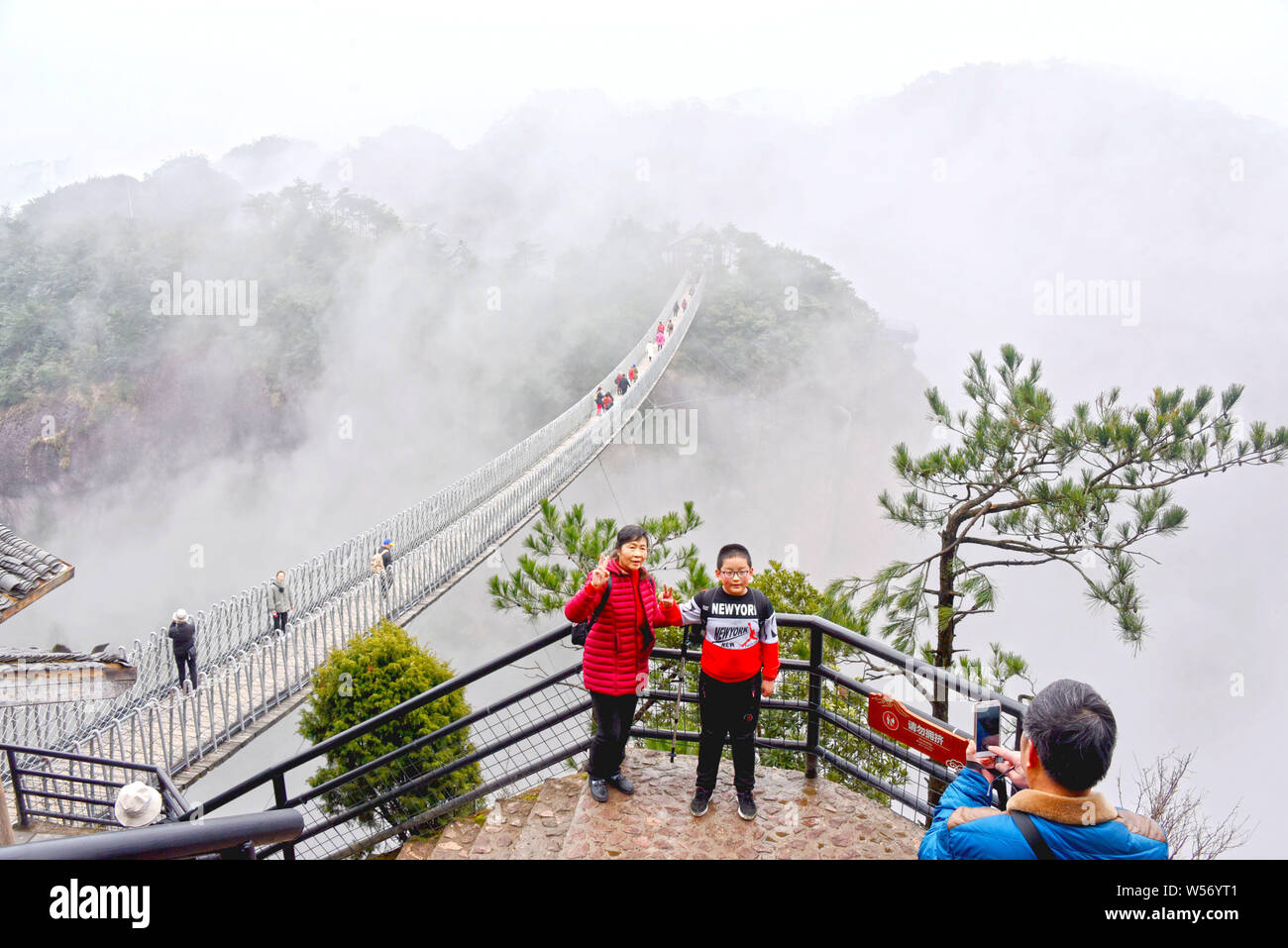 A view of seas of clouds floating through the Xianju National Park ...