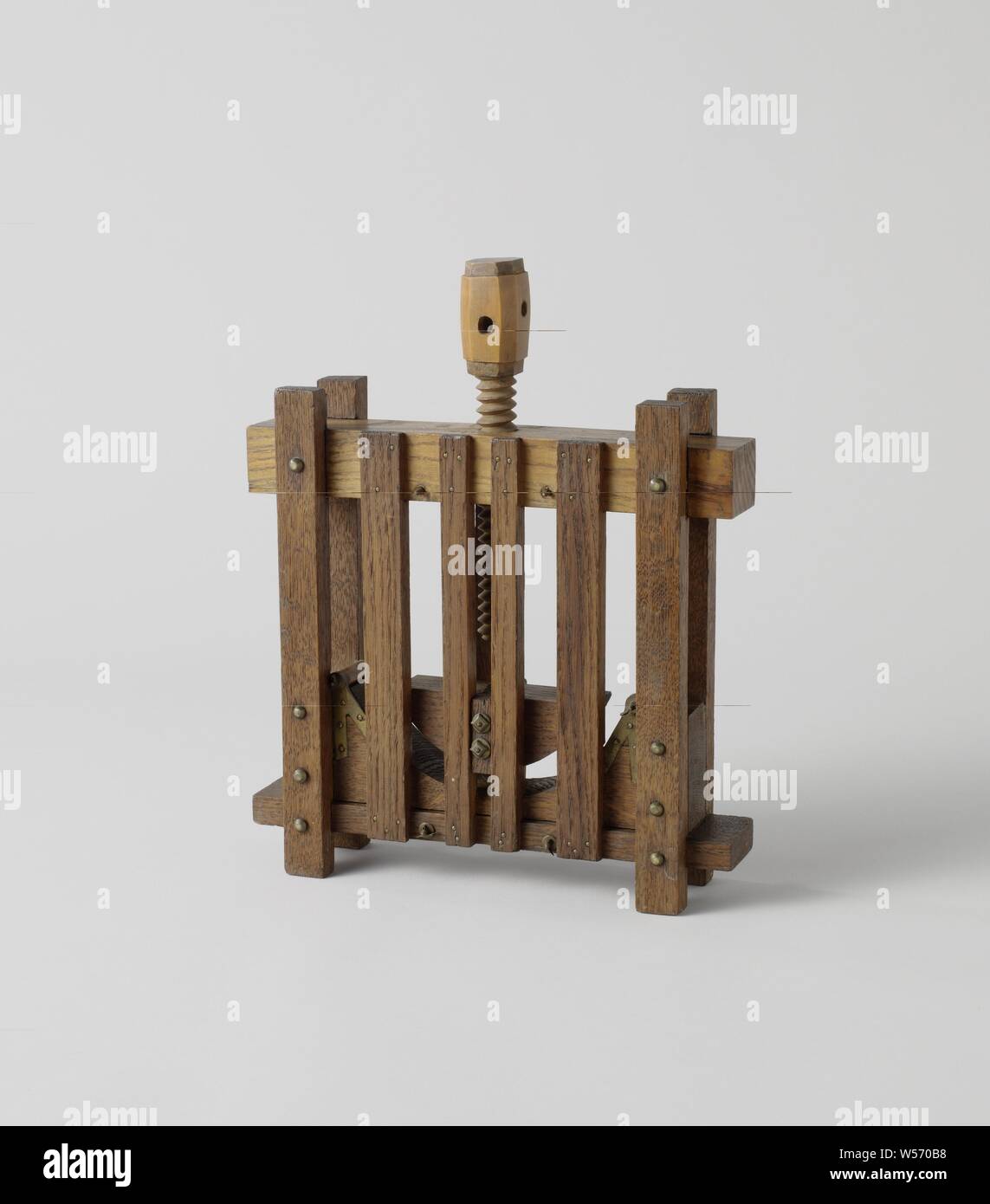 Model of a Chain Stopper, Model of a cable clamp made of oak with a ...