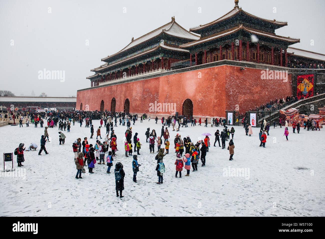 Tourists visit the Palace Museum, also known as the Forbidden City, in ...