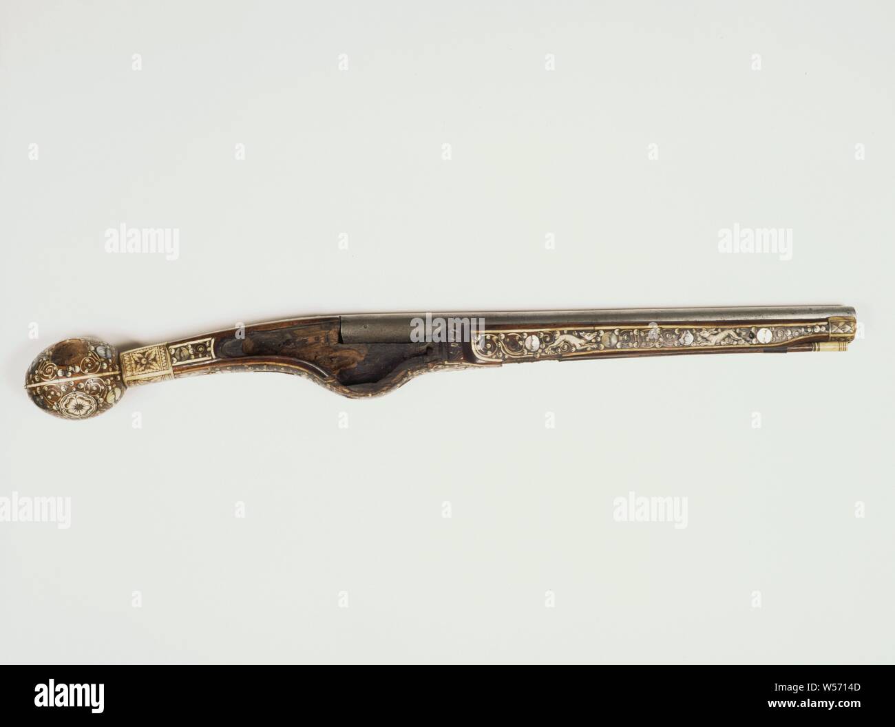 Gun with wheel lock with richly inlaid drawer and flask with ivory and ...